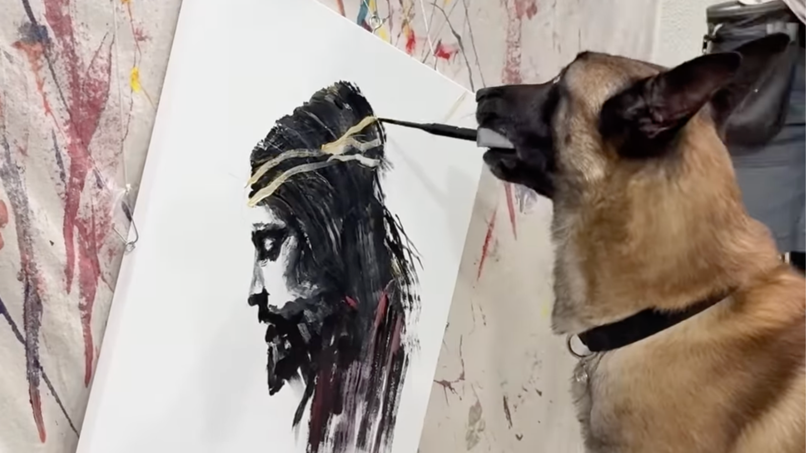 Trained Dog Goes Viral for Painting the Face of Jesus